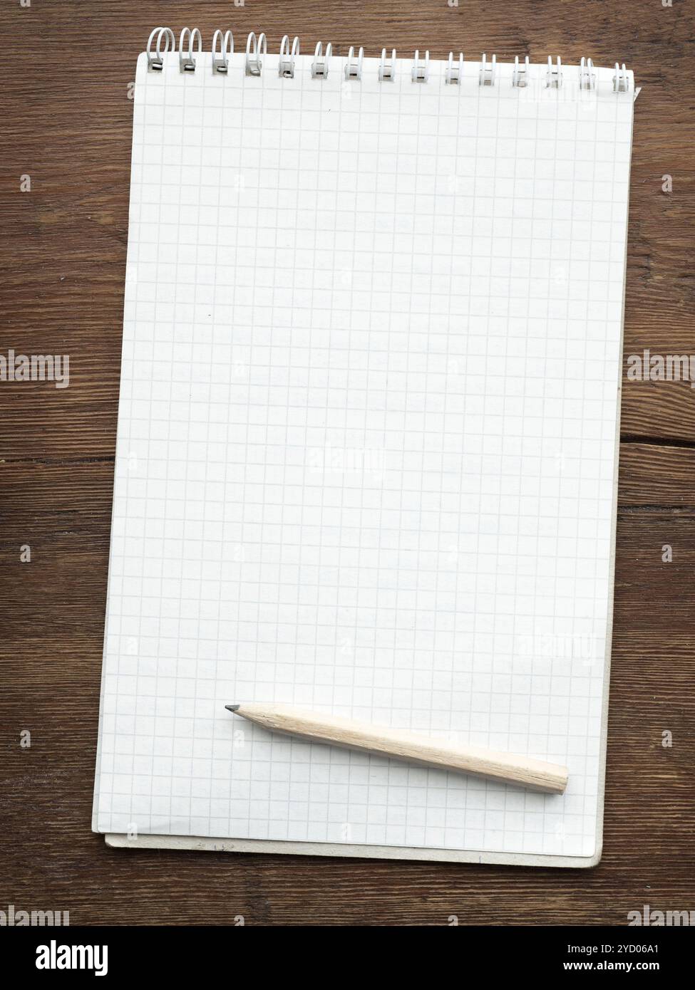 Notepad with pencil Stock Photo - Alamy