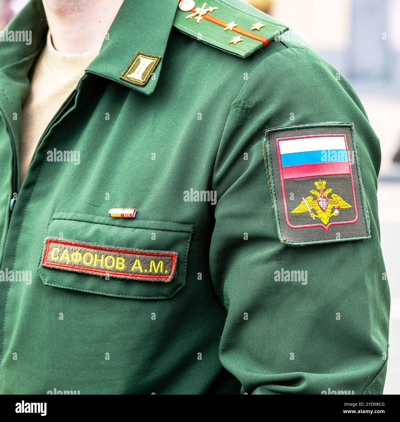 Chevron on the sleeve military uniforms Stock Photo - Alamy
