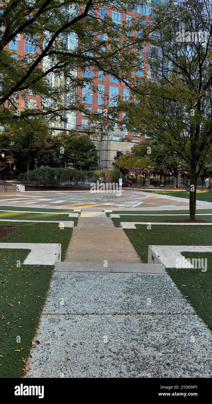 A vertical image of Reston Town Center Park in Autumn Stock Photo - Alamy