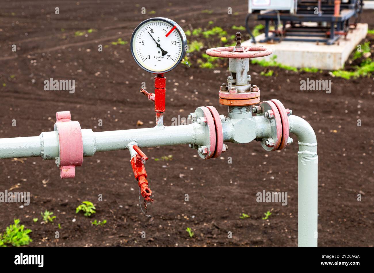 Pipeline with control valve and pressure meter Stock Photo - Alamy