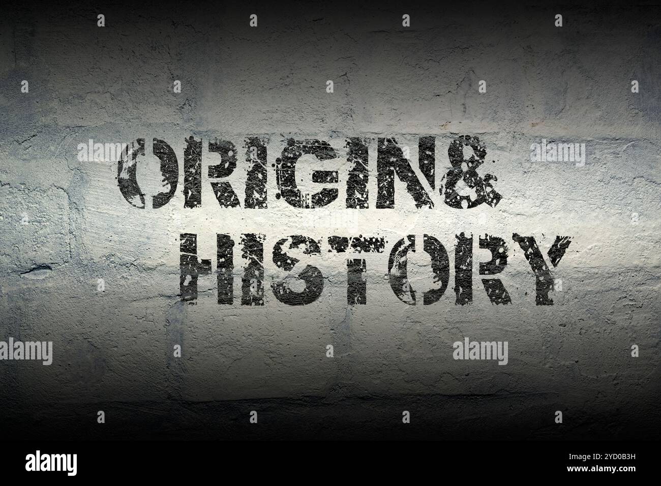 origin and history stencil print on the grunge white brick wall Stock ...