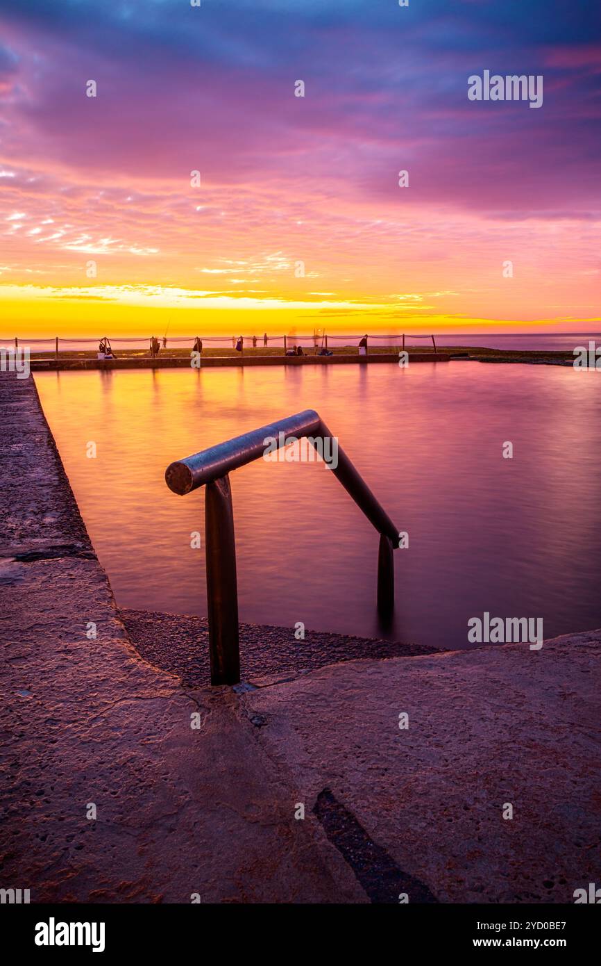 Vivid sunrise views across Mona Vale Rock Pool Stock Photo - Alamy