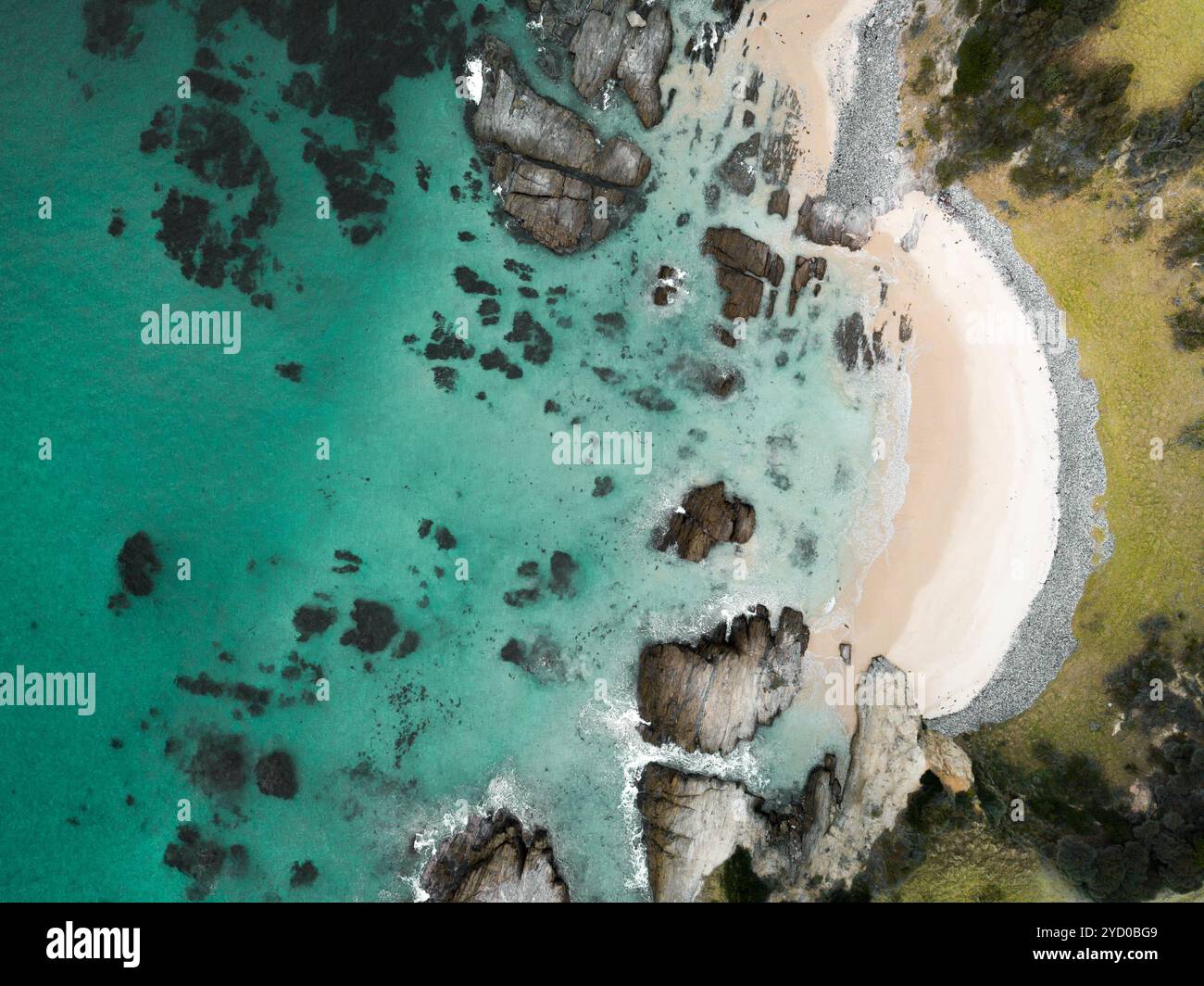 Aerial view of idyllic arc beach with pristine waters Stock Photo - Alamy