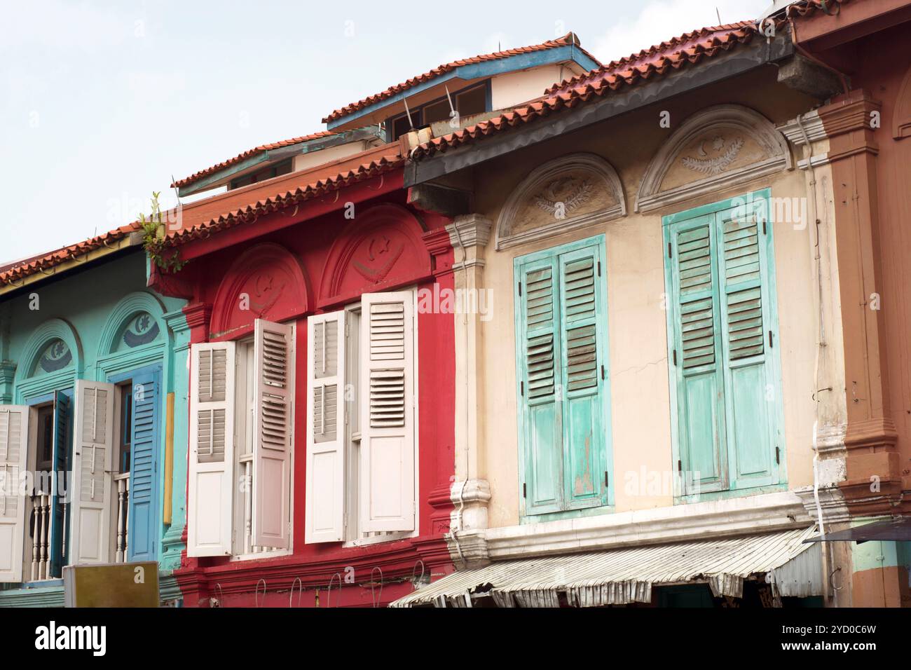 traditional colorful facades of houses in famous Little India district ...