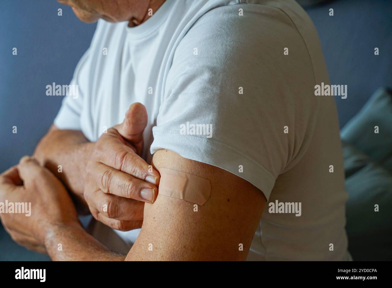 Detail of a man's arm with adhesive plaster for wound care Stock Photo ...