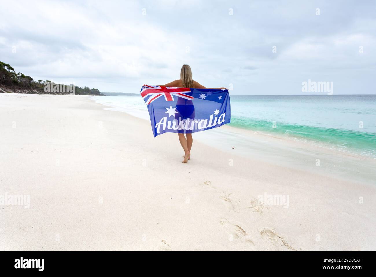 Female on beach with Australian flag Australia Pride Stock Photo - Alamy