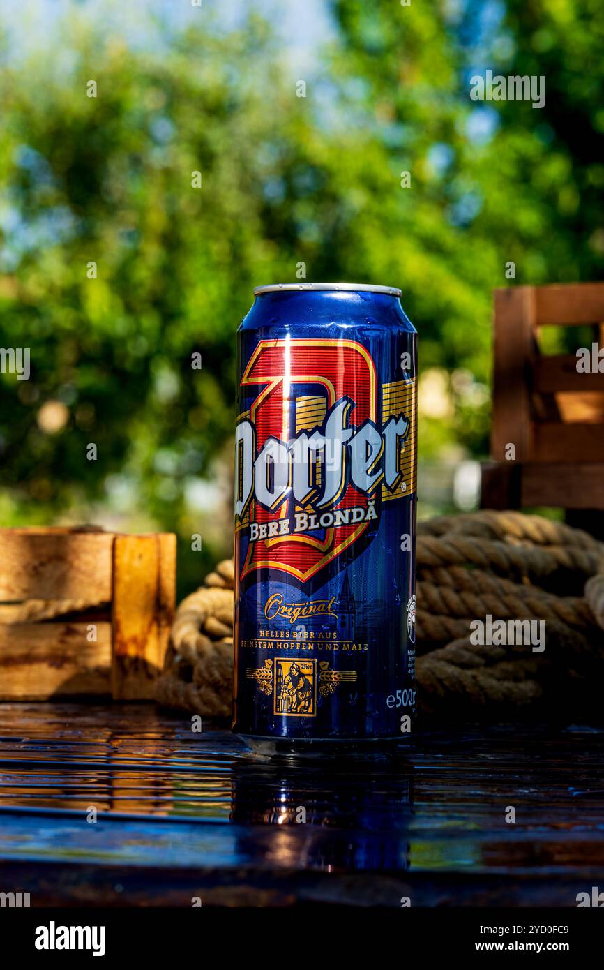 Dorfer beer can - condensation water droplets, outdoors background ...