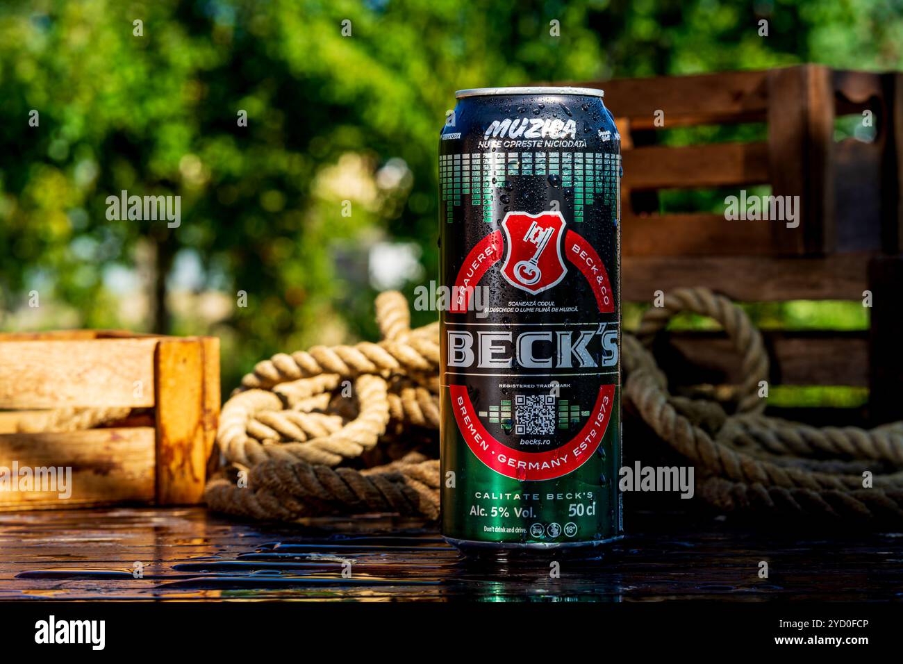 Beck's beer can - condensation water droplets, outdoors background ...