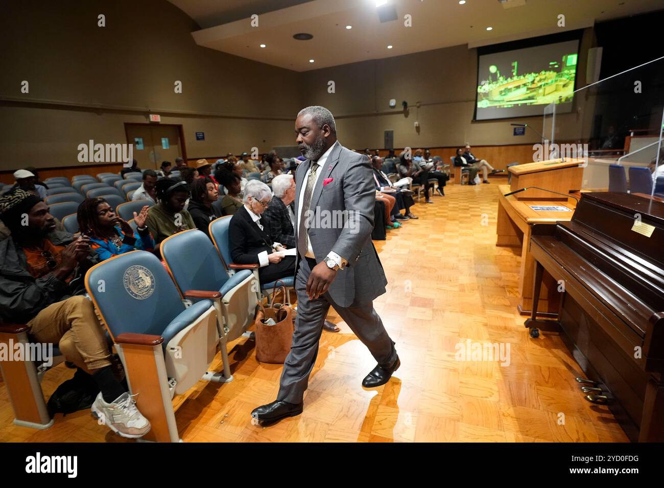 Sundiata Haley, son of Oretha Castle Haley, walks to his seat after ...