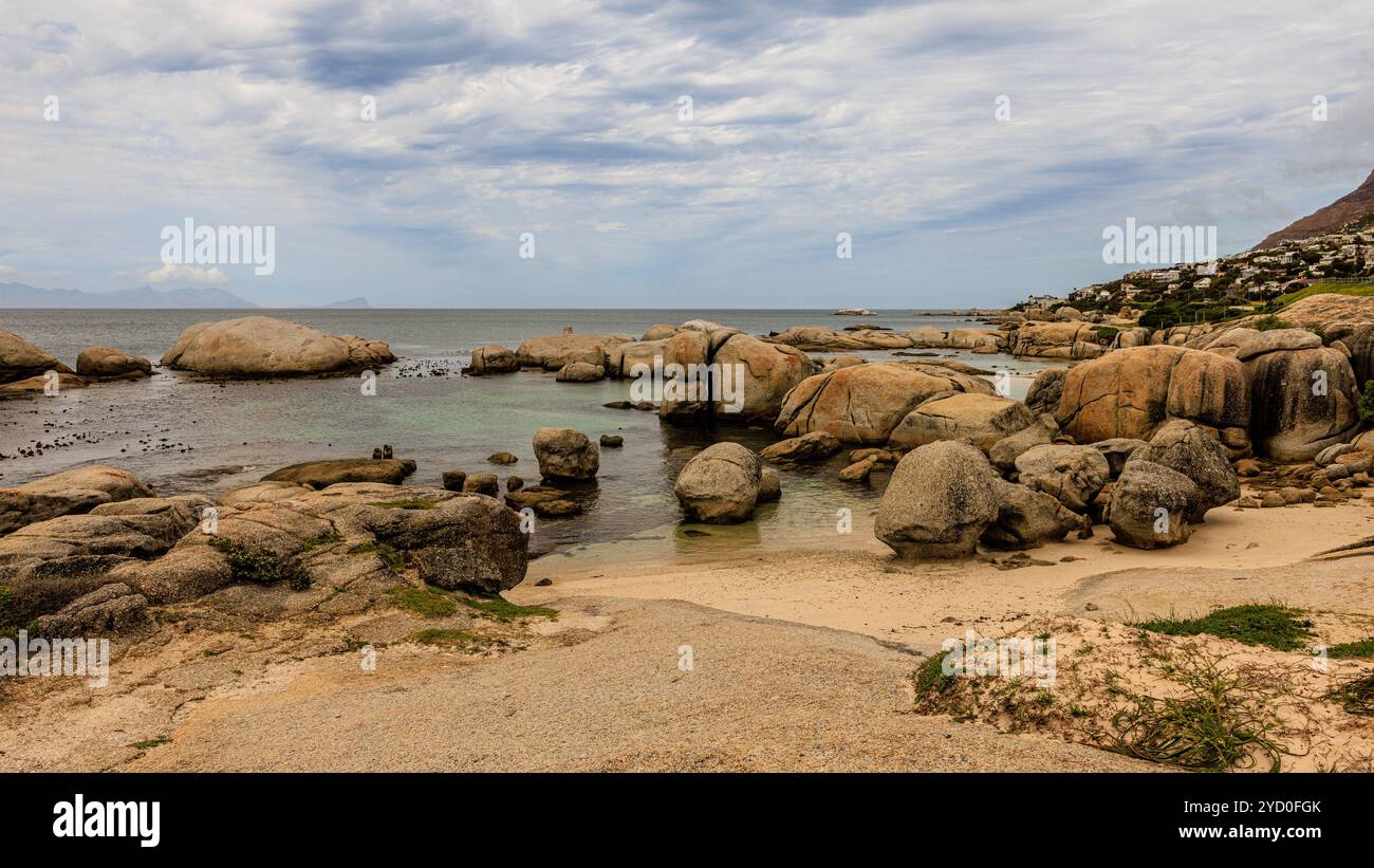 landscape of large granite boulders creating shallow water rock pools ...