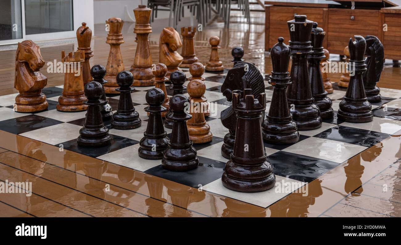 Chessboard and chess pieces on the deck of cruise ship Stock Photo - Alamy