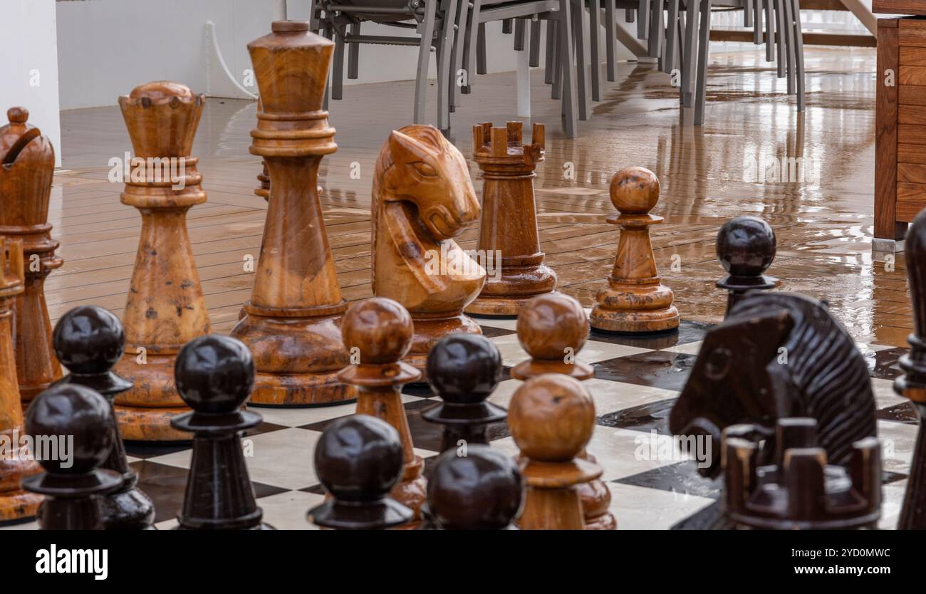 Chessboard and chess pieces on the deck of cruise ship Stock Photo - Alamy