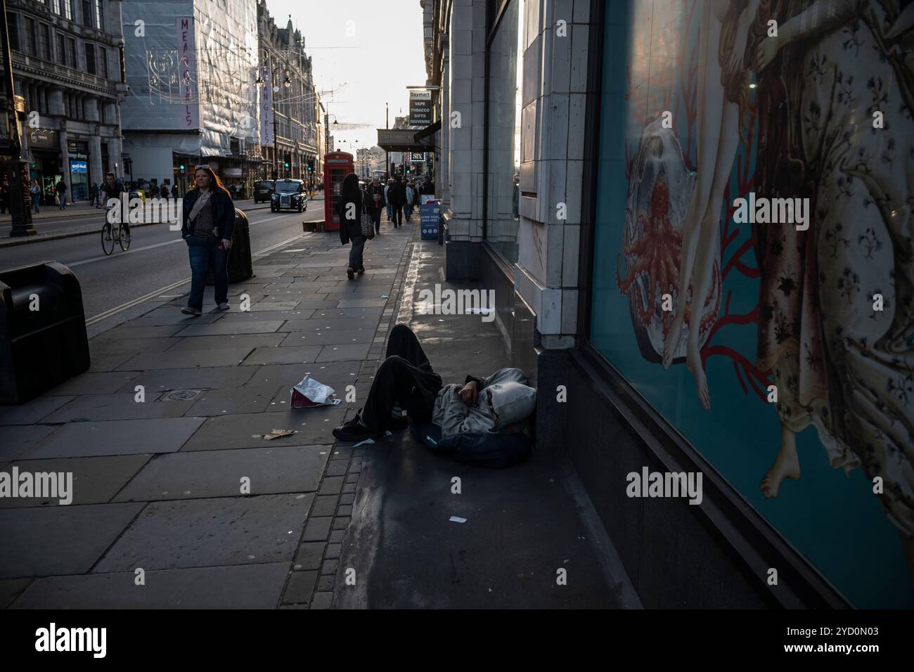 Homeless man on the pavement along The Strand, in London's West End ...