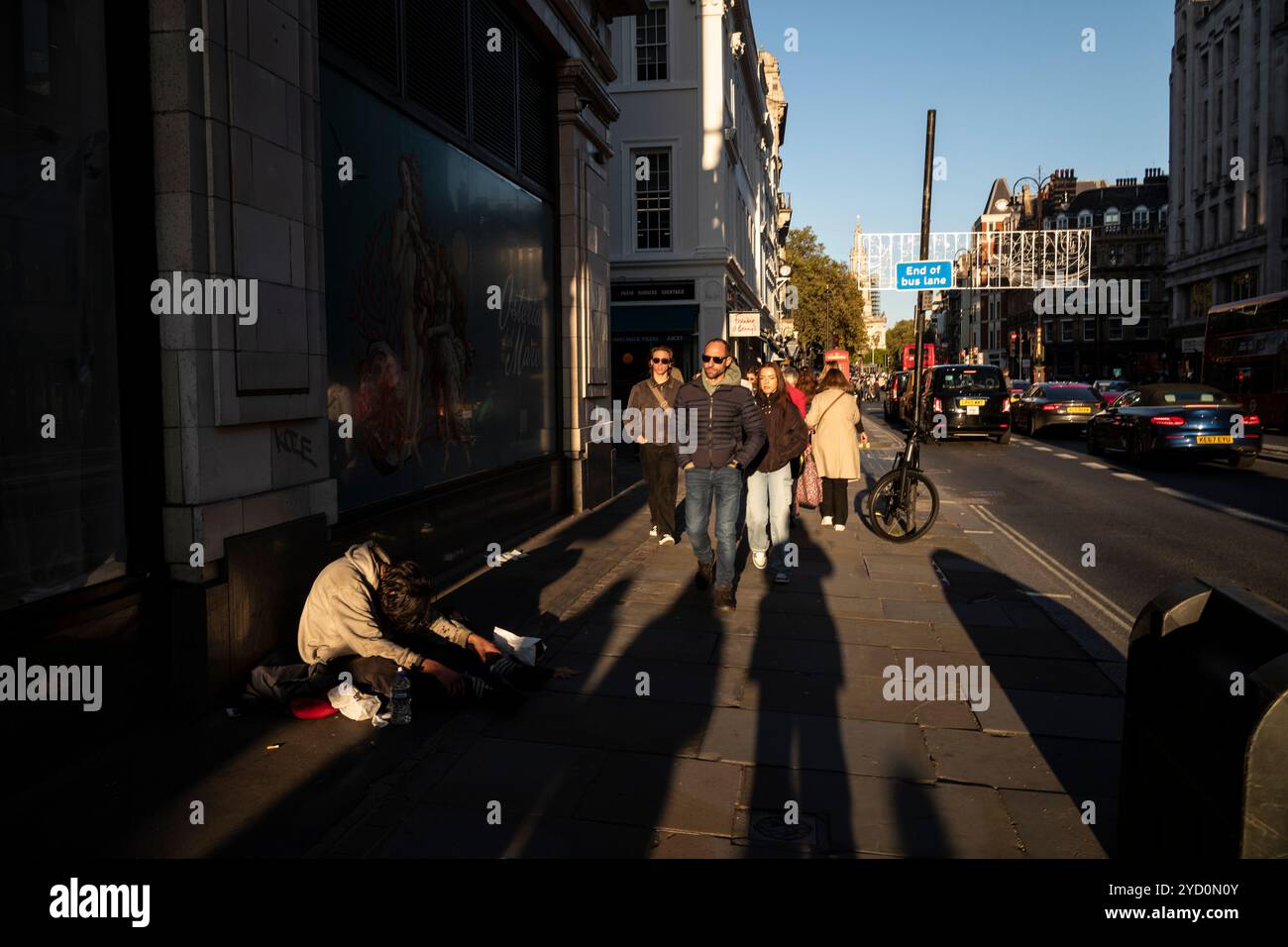 Homeless man on the pavement along The Strand, in London's West End ...