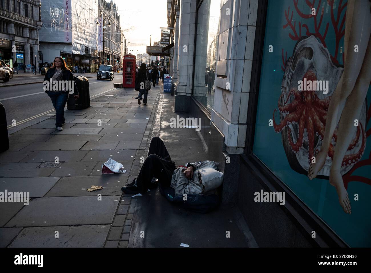 Homeless man on the pavement along The Strand, in London's West End ...