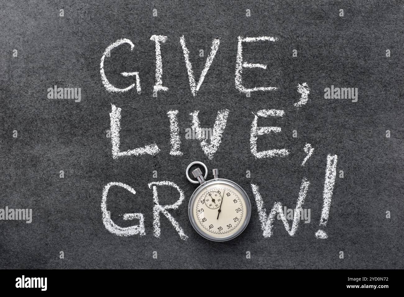 give, live, grow slogan handwritten on chalkboard with vintage precise ...