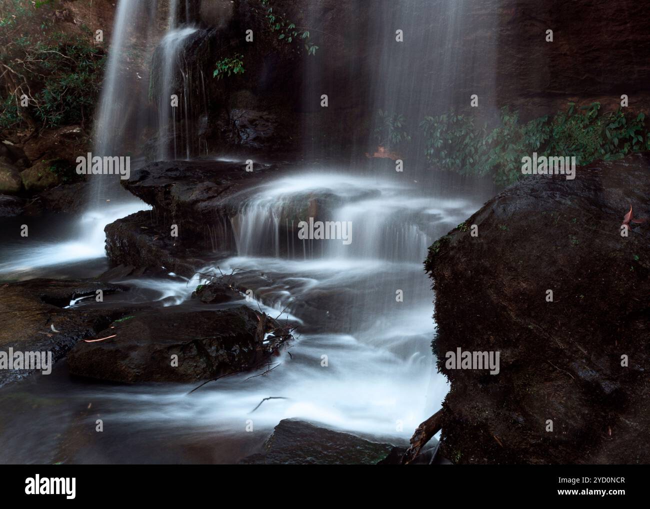 Waterfall grotto a lovely tranquil spot with a nice swimming hole Stock ...