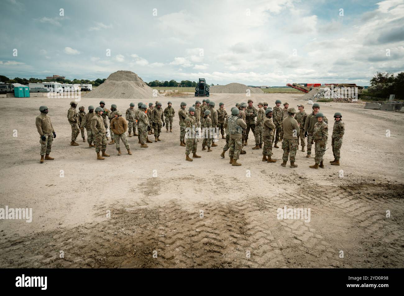 U.S. Airmen gather in preparation to build a berm during a bivouac ...