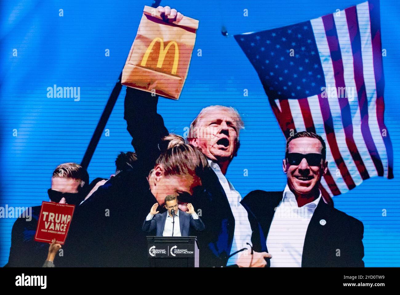 Duluth, United States. 23rd Oct, 2024. Benny Johnson speaks during a ...