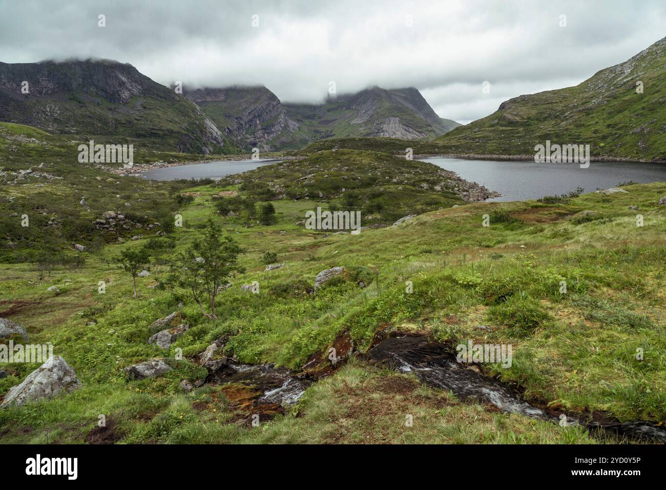 Lush meadows and tranquil lakes reflect the dramatic mountain ranges of ...