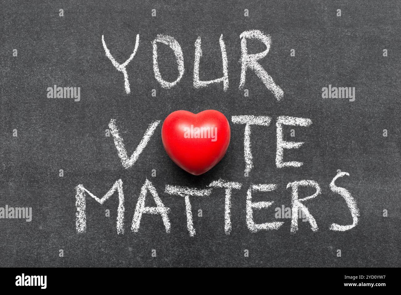 your vote matters phrase handwritten on blackboard with heart symbol ...