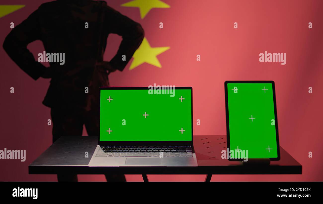 China army soldier using isolated screen laptop and tablet to identify ...