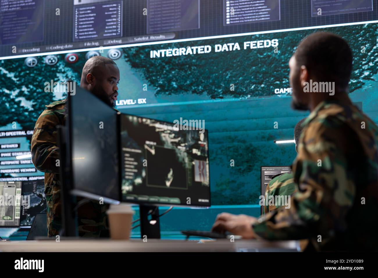Cybersecurity Team Operates In An Advanced Military Command Center Managing Surveillance