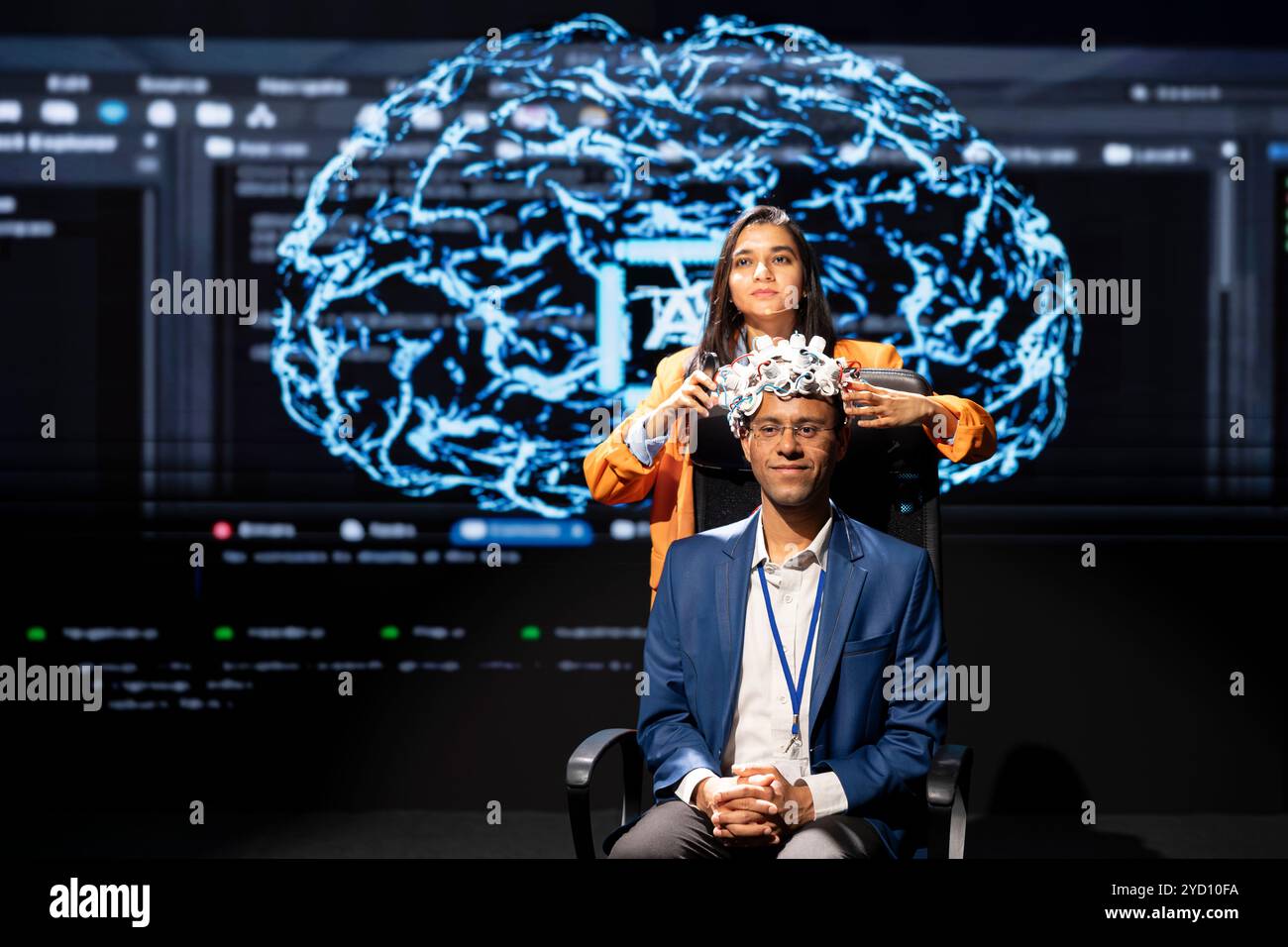 Experts speaking at tech event, explaining impact of neural implants ...