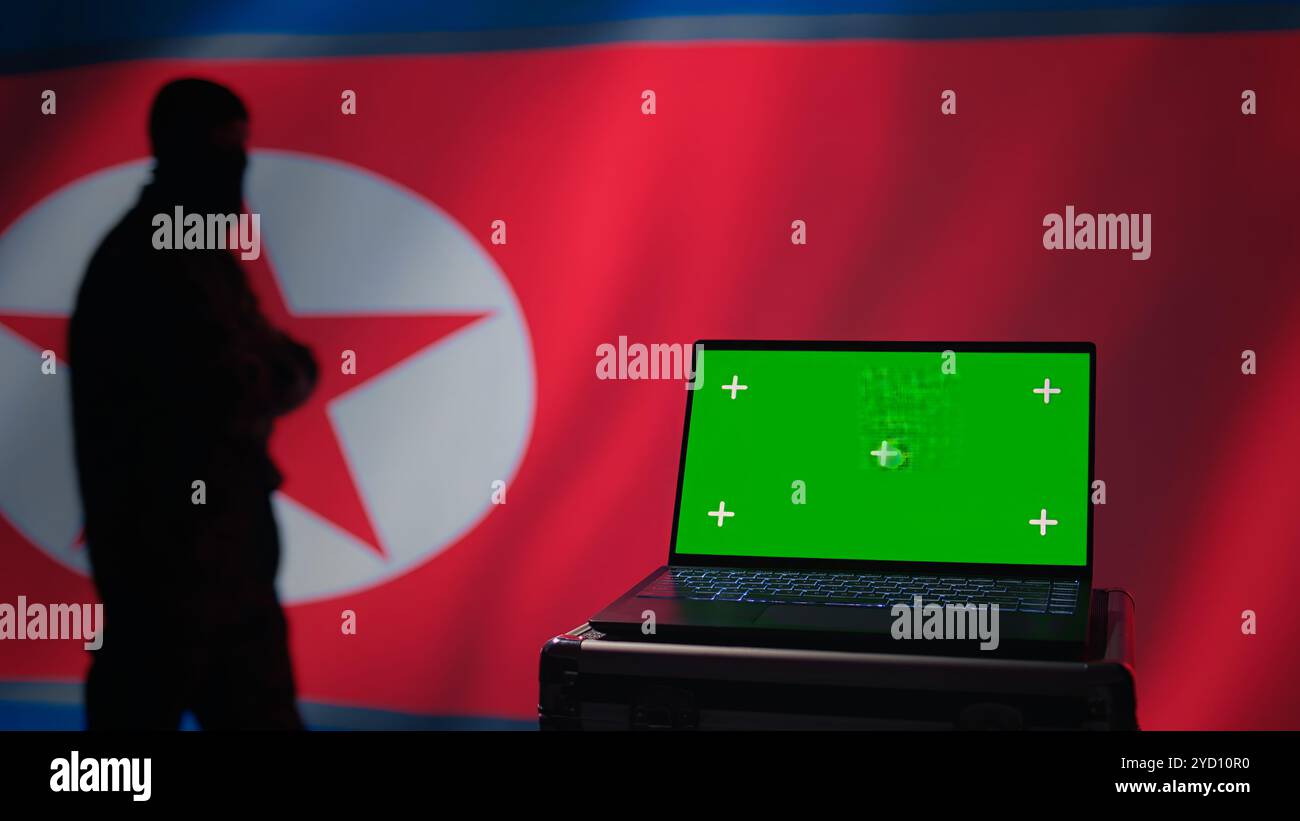 North Korea army soldier using military tech on green screen laptop to ...