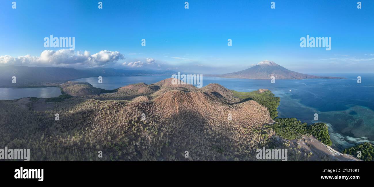 Daybreak illuminates the scenic island of Lembata in Indonesia. This ...