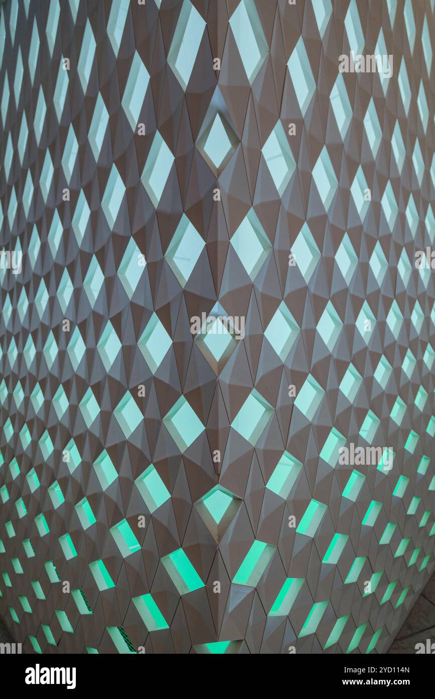 The stunning electric blue and metal ceiling design features a mesh of ...