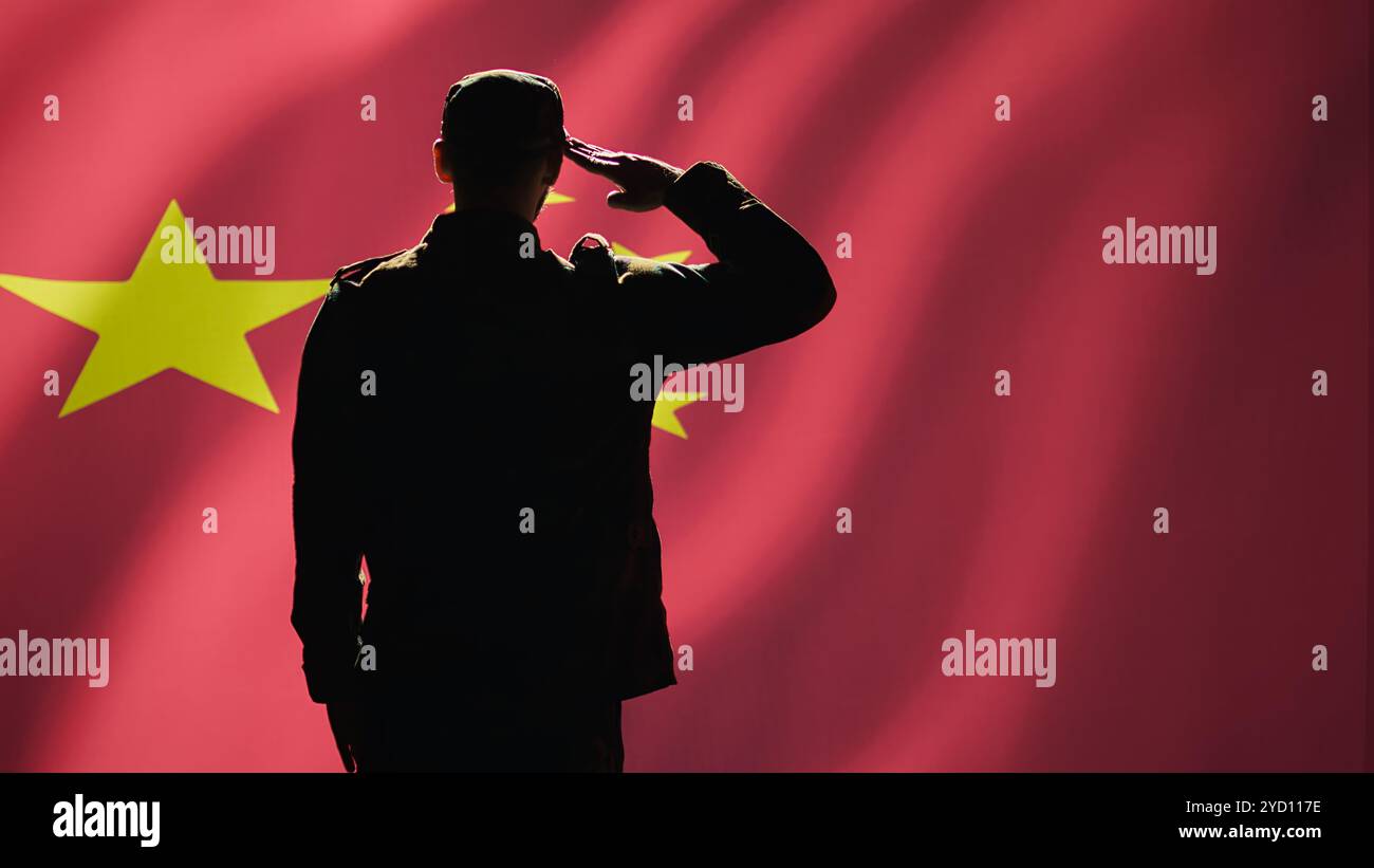 Soldier doing salute hand gesture towards Chinese flag, feeling pride ...