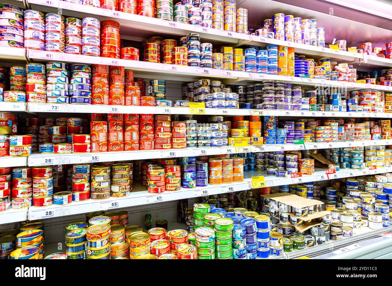 Canned fish in cans for sale in hypermarket Stock Photo - Alamy