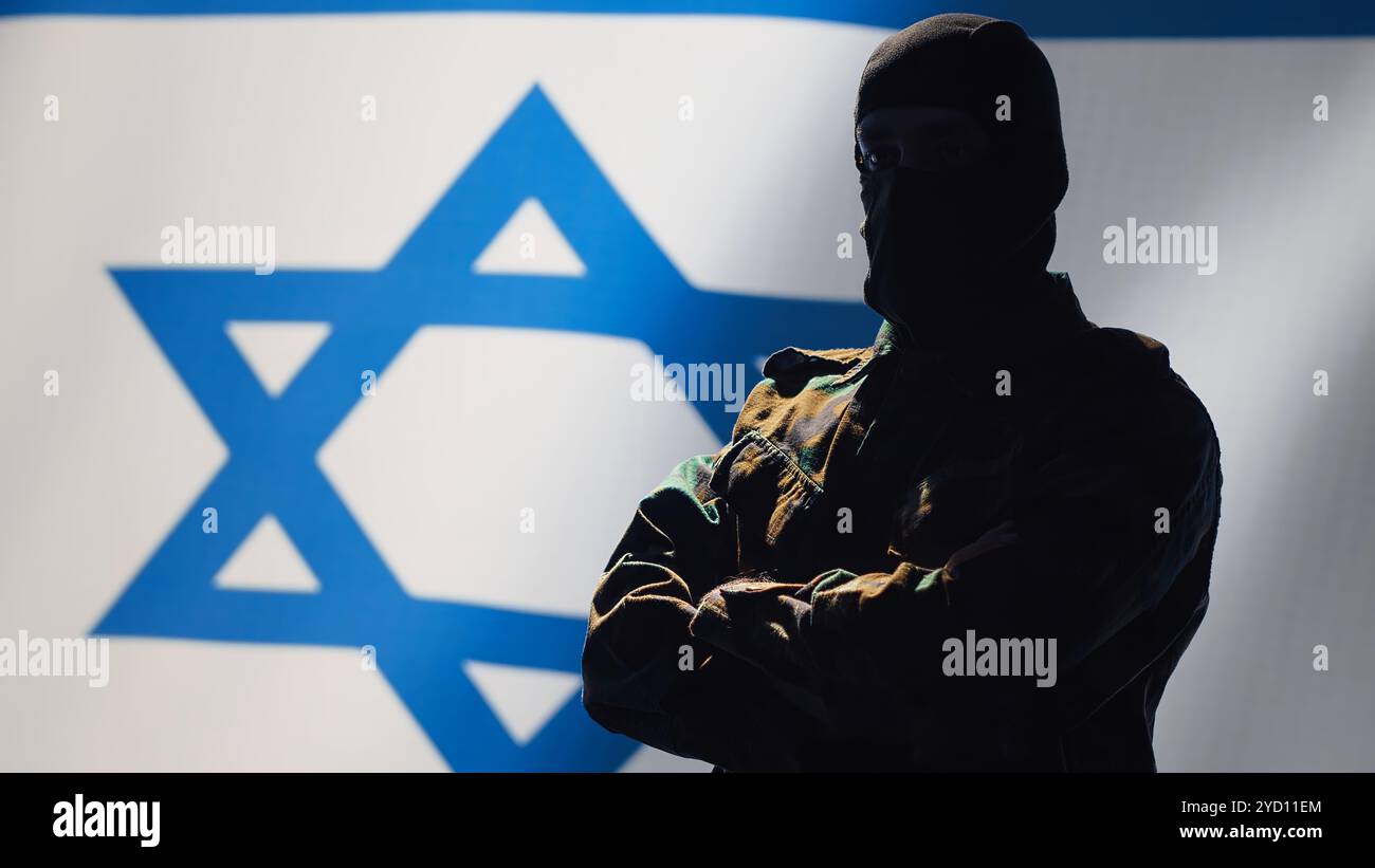 Mossad operator wearing mask to remain anonymous standing proud in ...