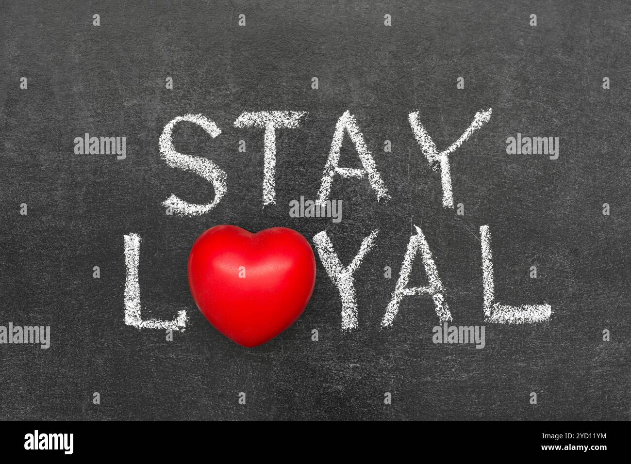 stay loyal phrase handwritten on chalkboard with heart symbol instead ...