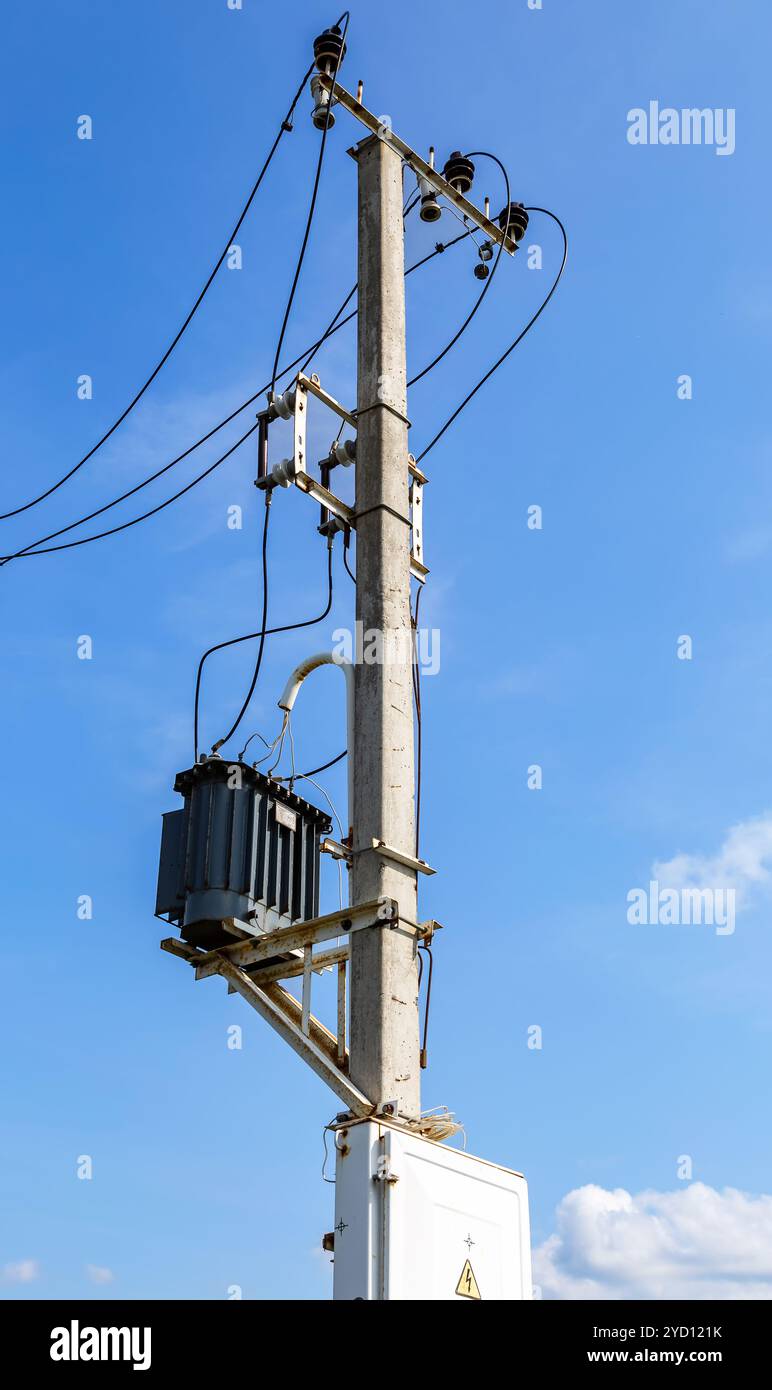 Transformer of high power station on the pillar Stock Photo - Alamy