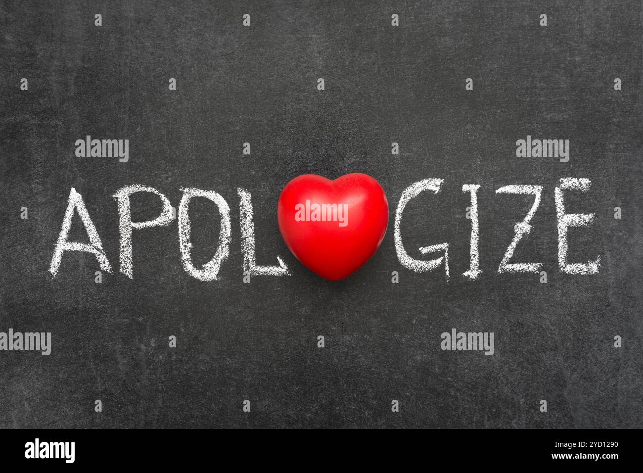 apologize word handwritten on blackboard with heart symbol instead of O ...