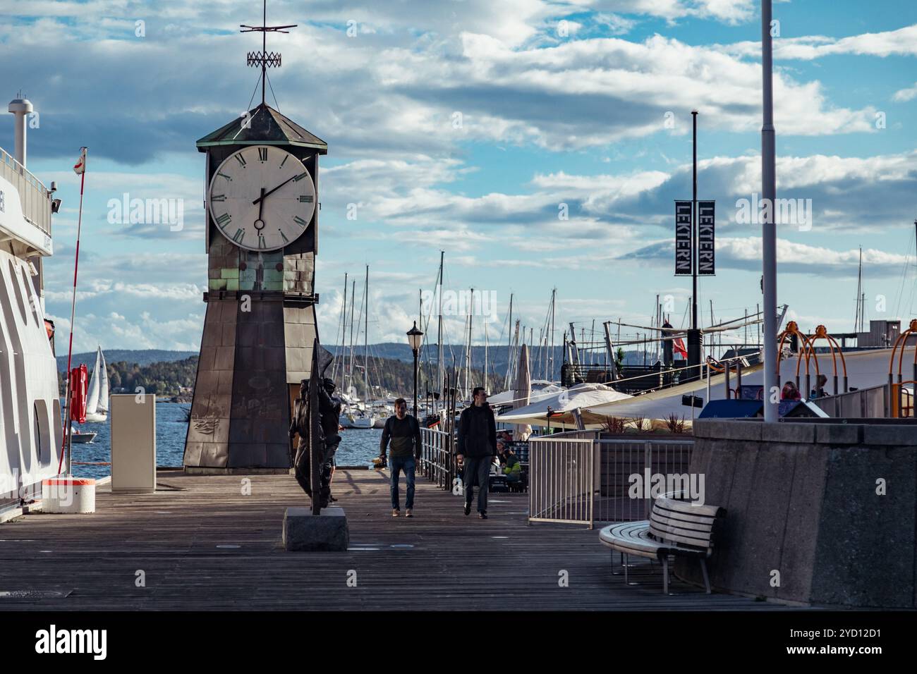 Oslo, Norway - 18 Aug 2018: Clock tower at Oslo Harbour under blue ...
