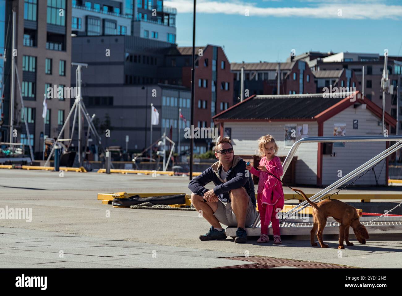 Bodo, Norway - 12 Aug 2018: Father and daughter enjoy a day with their ...