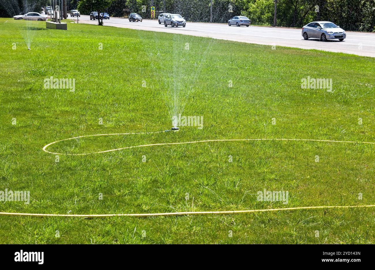 Automatic watering lawn on summer hi-res stock photography and images ...