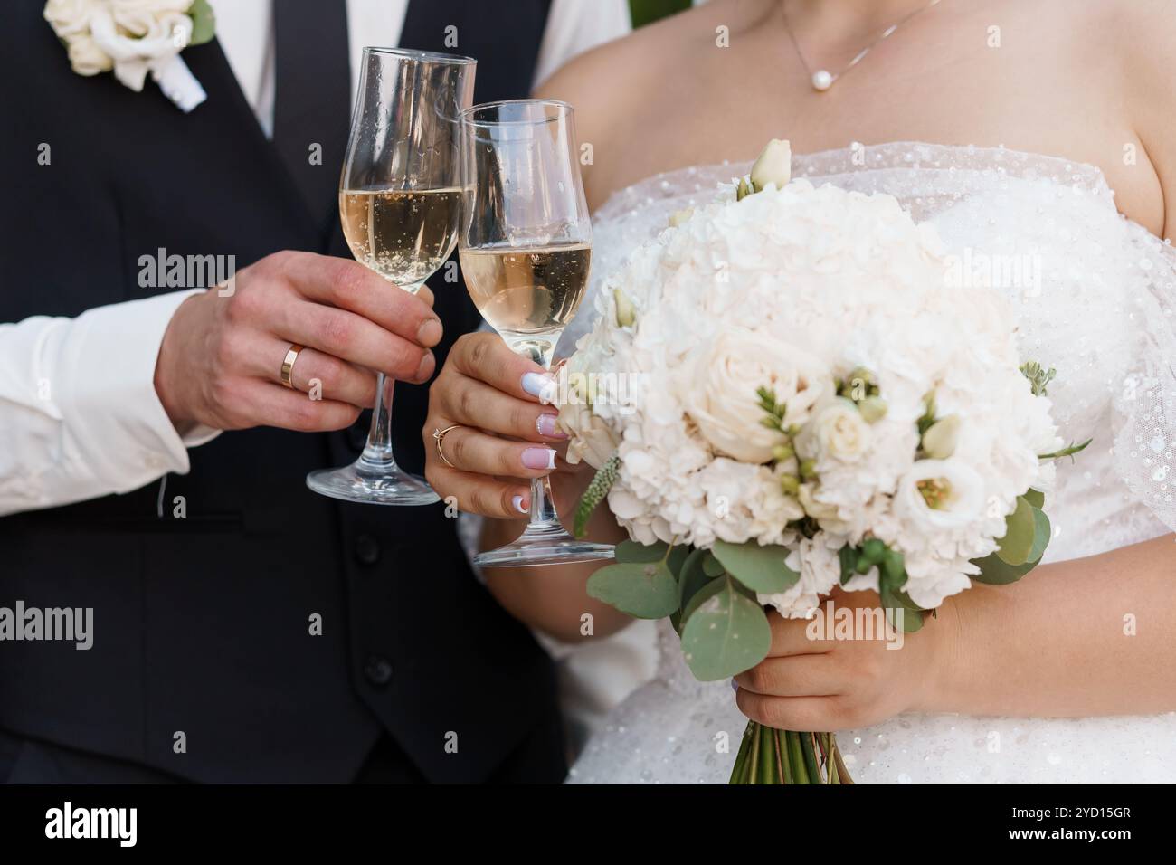 Romantic Wedding Toast with Elegant Champagne Glasses and Bridal ...