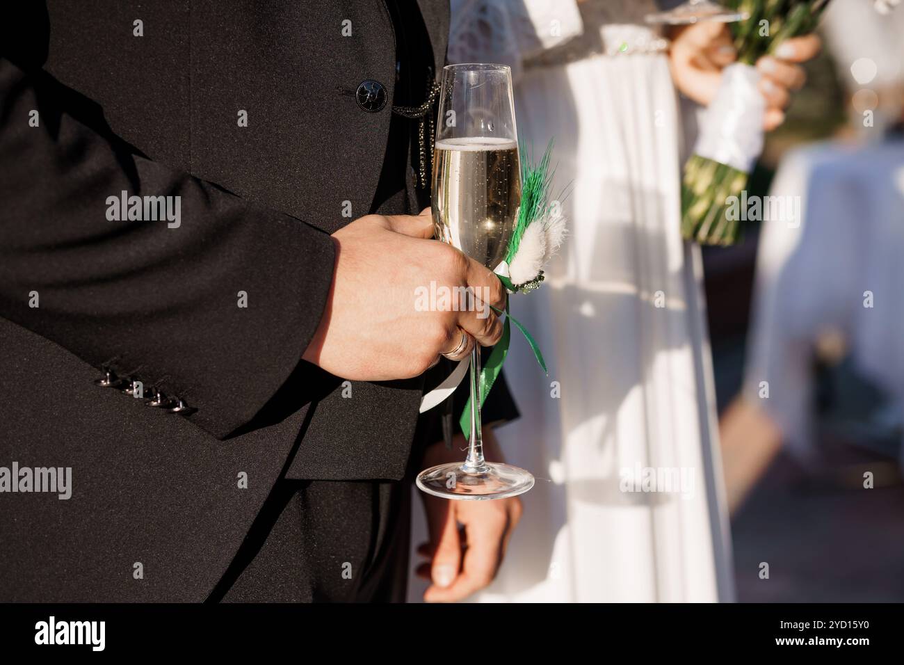 Elegant Wedding Toast with Champagne and Floral Accents Stock Photo - Alamy