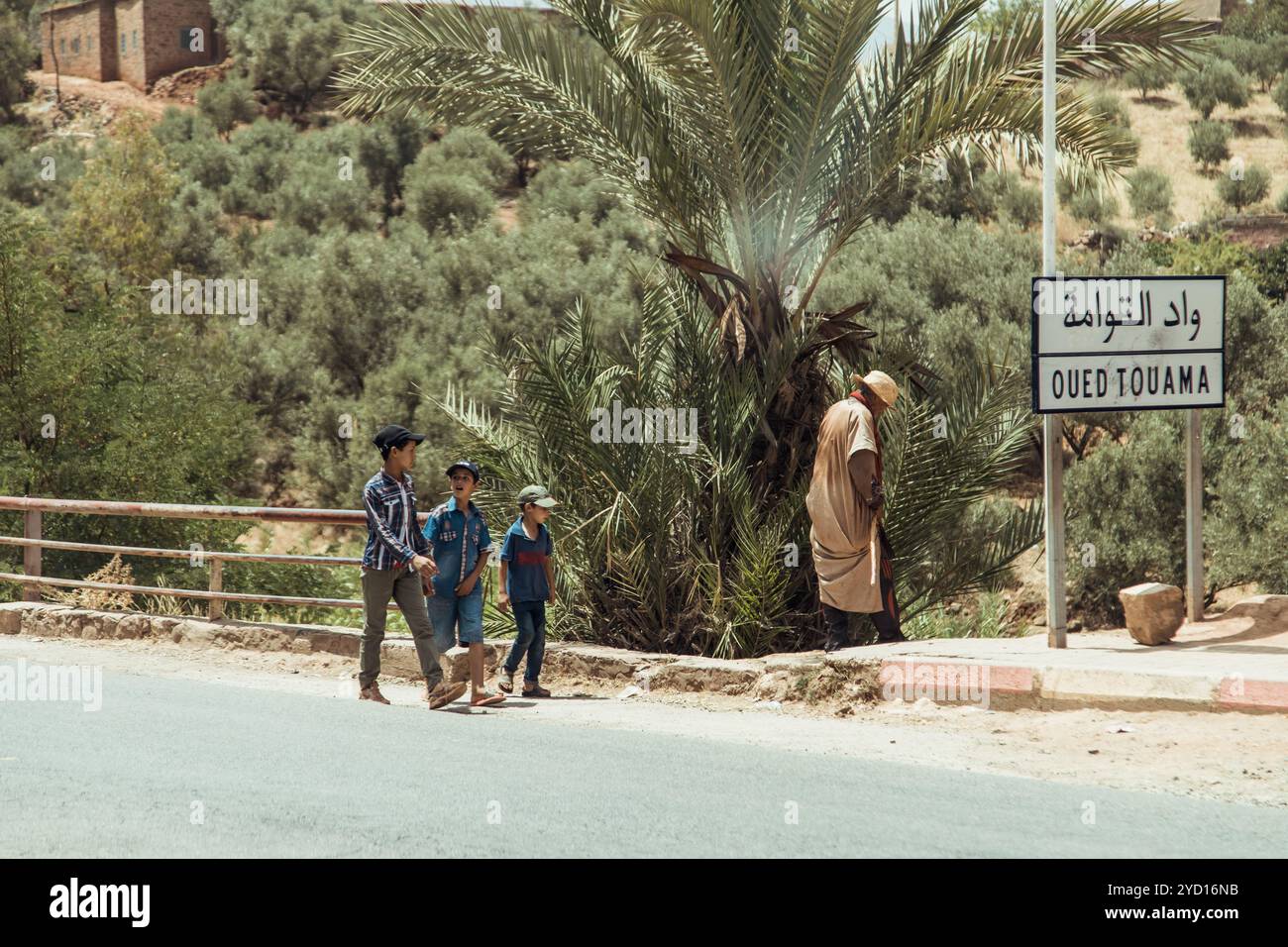 Countryside, Morocco, July 23th 2019: Families walking along a Moroccan ...