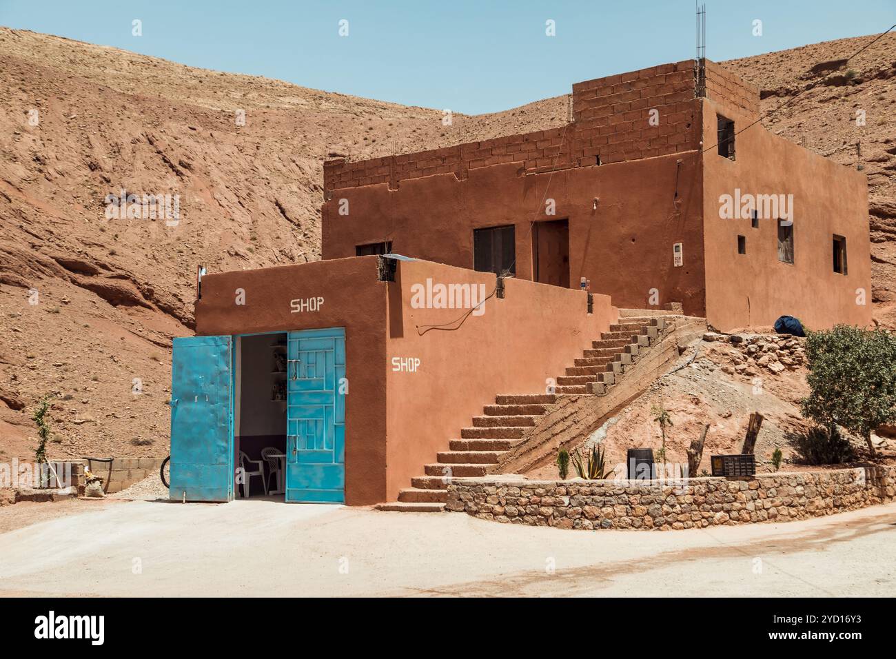 A historic Moroccan structure, built from local materials, stands ...