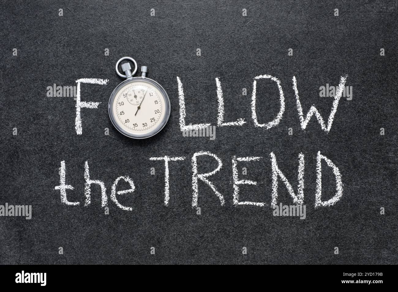 follow the trend phrase handwritten on chalkboard with vintage precise ...