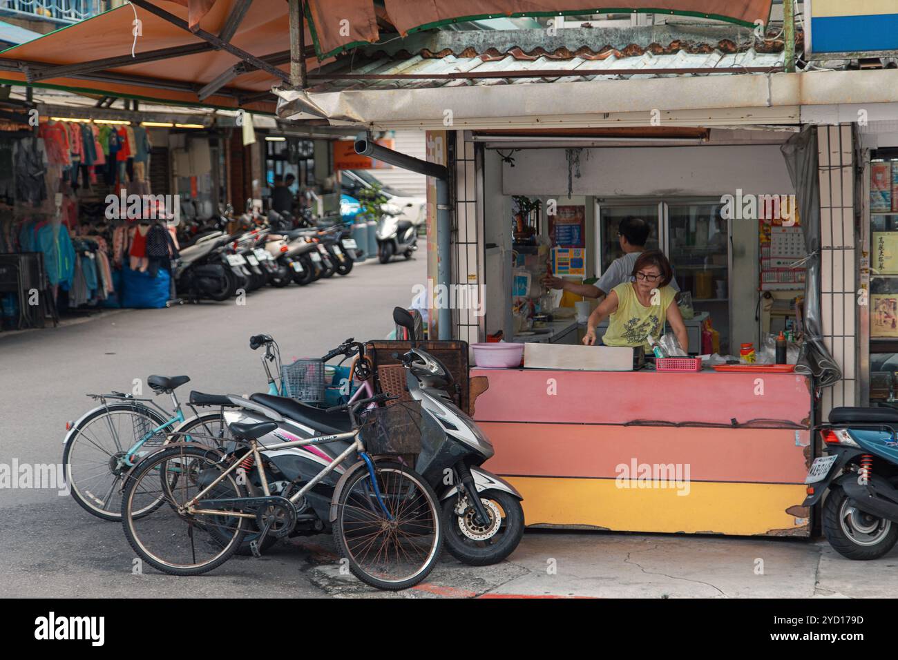 Taipei, Taiwan - October 10th 2019: A bustling market stall in Taipei with vibrant colors and ...