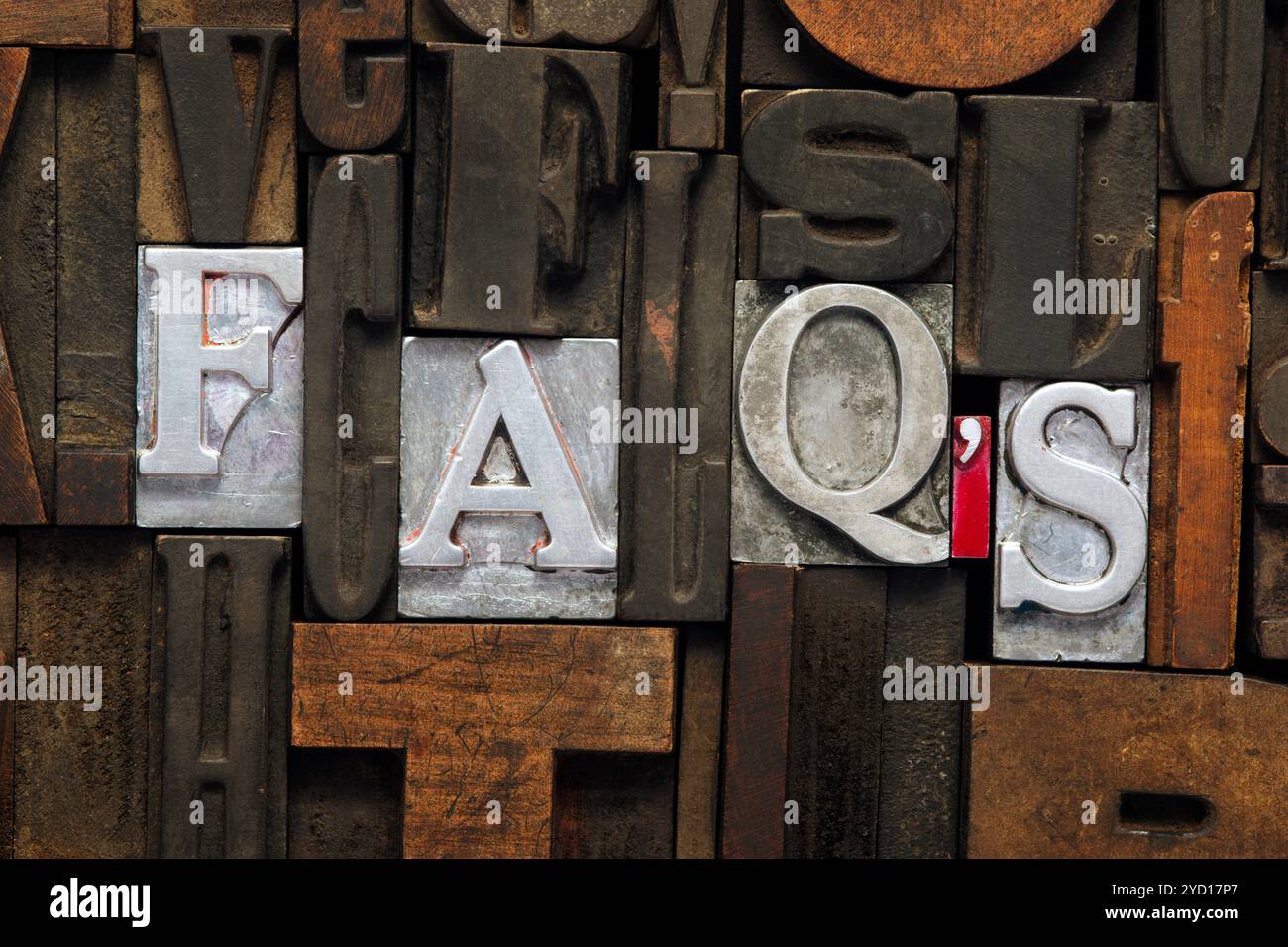 FAQs abbreviation made from metallic letterpress blocks in mixed wooden ...