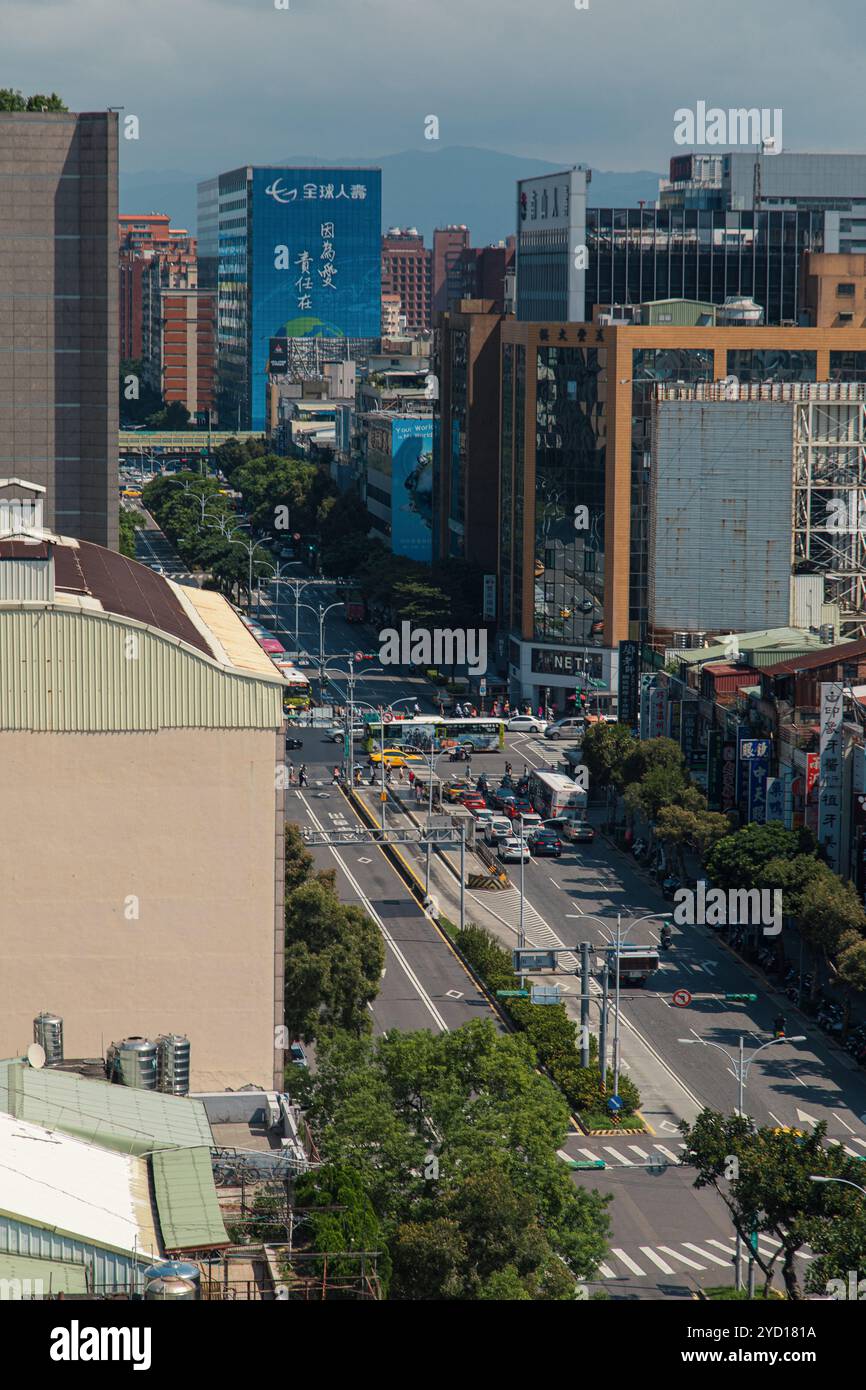 A lively street in Taipei captures the essence of urban life, with busy ...
