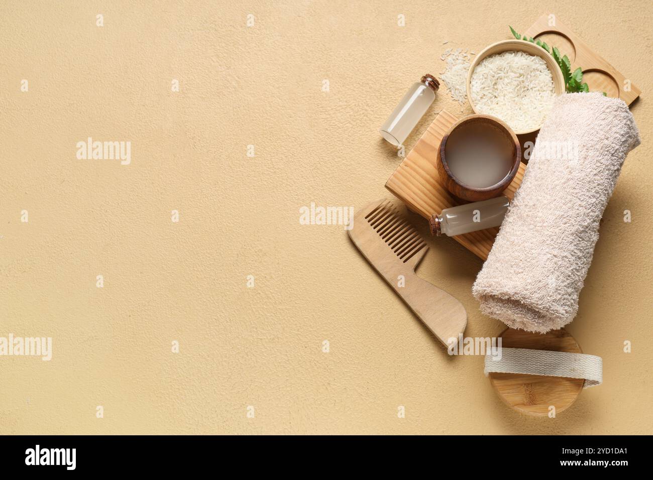 Rice water, grains and bath supplies on color background Stock Photo ...