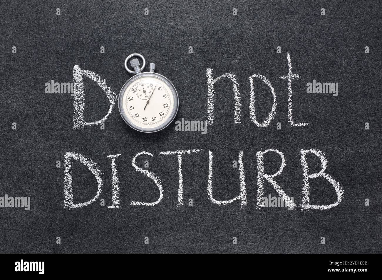 do not disturb request handwritten on chalkboard with vintage precise ...